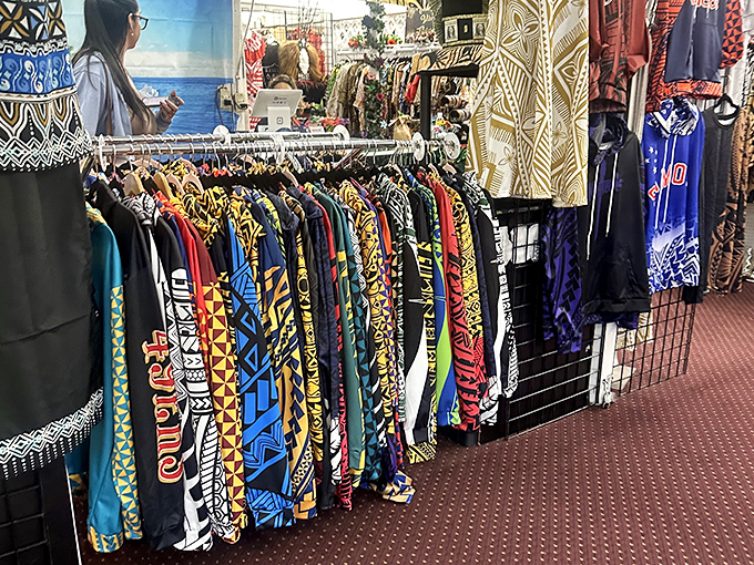 A rainbow explosion of fabrics that proves fashion doesn't need a runway when it has this much personality hanging on simple metal racks.