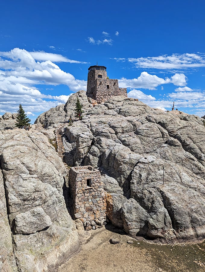 Black Elk Peak's stone fire tower stands like a medieval castle, minus the moat but with 100% more breathtaking panoramas.