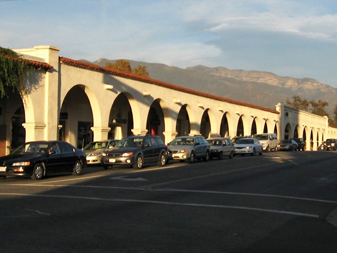 The Arcade's white arches frame the Topatopa Mountains like a series of perfect postcards, each one begging to be your next social media humble-brag.