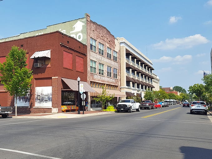 Main Street stretches before you like a living museum where people actually shop, dine, and gather rather than just point at placards about the good old days.