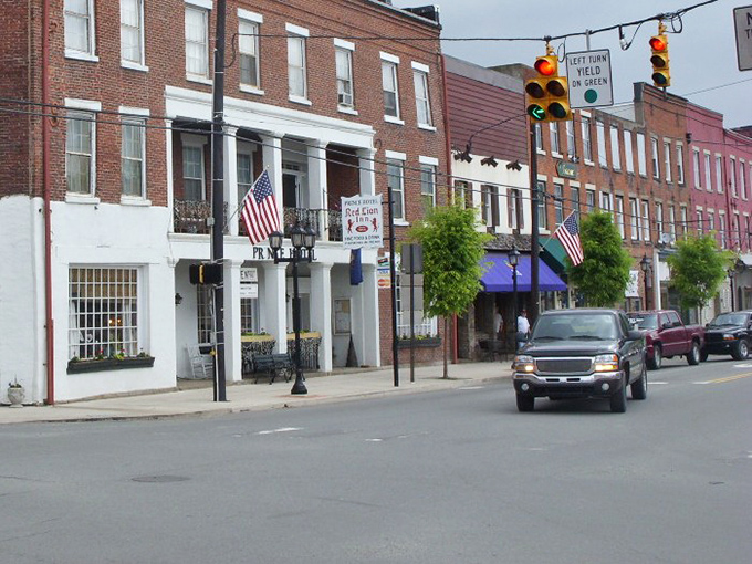 American flags flutter along Tunkhannock's main thoroughfare, where historic buildings stand as proud sentinels of small-town perseverance and charm.