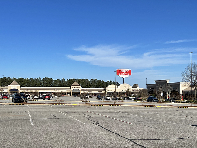 The sprawling retail landscape of Tanger Outlets stretches toward the horizon, promising adventures in shopping that could fill an entire day.