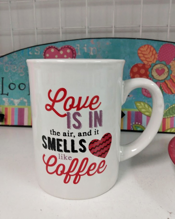 Coffee lovers will appreciate this mug's philosophy: romance should always smell like your favorite morning brew.