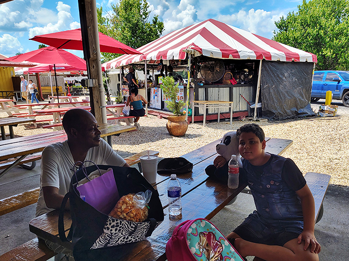 The outdoor food court offers the perfect excuse to refuel between treasure hunting sessions under Louisiana skies.