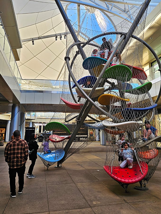 Playground in the marketplace! This sculptural climbing structure offers kids a chance to burn energy while parents debate between kale and cauliflower.