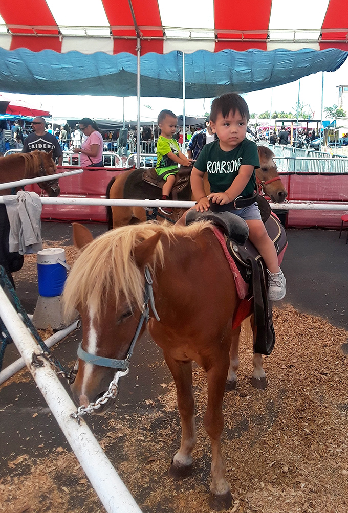 Pony rides offer young visitors a break from shopping, because even future bargain hunters need their cowboy moments.