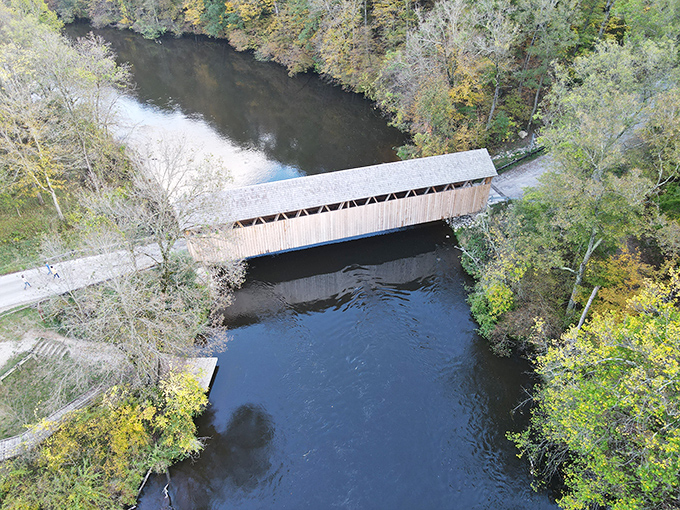 Autumn transforms the Flat River into a mirror reflecting golden hues. Mother Nature showing off her Instagram filters before filters were cool.