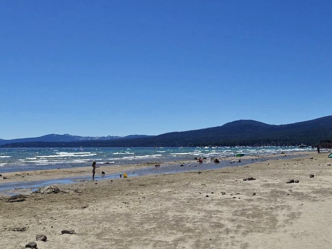 Beach day, mountain style. The Sierra peaks provide a backdrop that makes your vacation photos look like you splurged on a professional photographer.