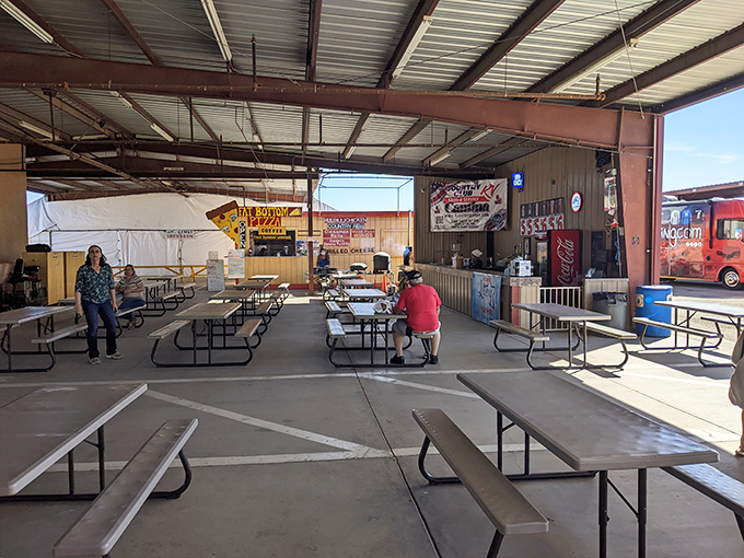 The market's culinary pit stop, where weary shoppers refuel before diving back into the treasure hunt. Bargaining builds an appetite!