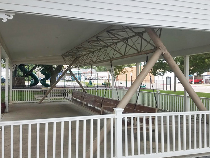 Engineering meets whimsy in this side view. The structural supports aren't just functional&mdash;they're part of the swing's distinctive character.