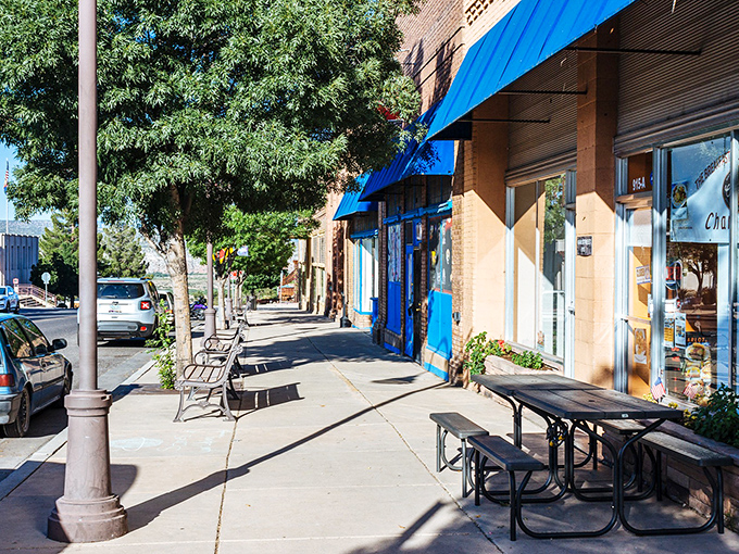 Shaded sidewalks invite leisurely strolls past local shops. The picnic table says, "Sit a spell&mdash;your emails will still be there tomorrow."