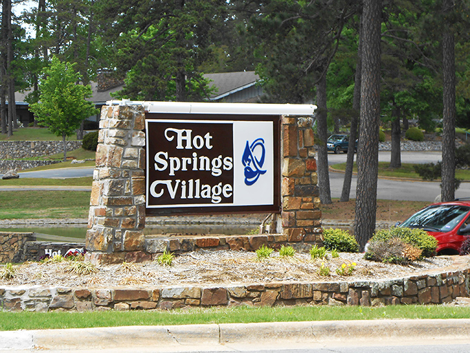 The Village entrance sign stands as the gateway to what locals affectionately call "the bubble" &ndash; where life moves at the pace you choose.