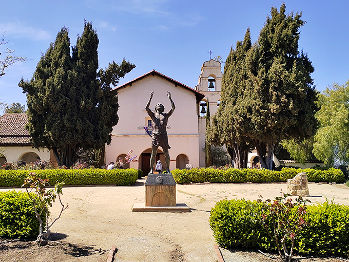 This statue of Saint John the Baptist welcomes visitors to California's largest mission church, where Hitchcock once filmed scenes for "Vertigo."