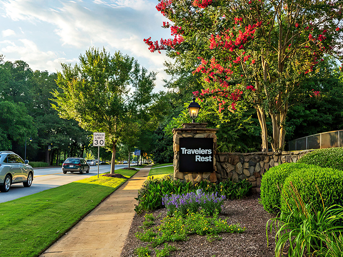 The welcoming entrance to Travelers Rest, where landscaping isn't just maintained&mdash;it's practically curated like a living gallery.