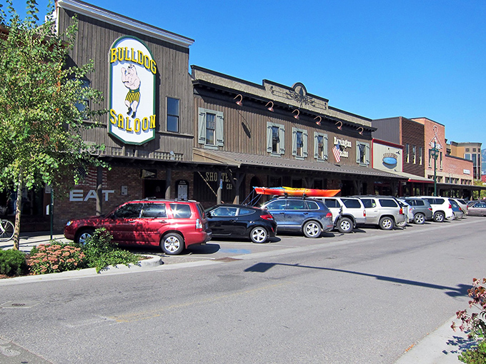 The Bulldog Saloon's iconic sign watches over downtown like a friendly local, ready to share tales of powder days and fish "this big."