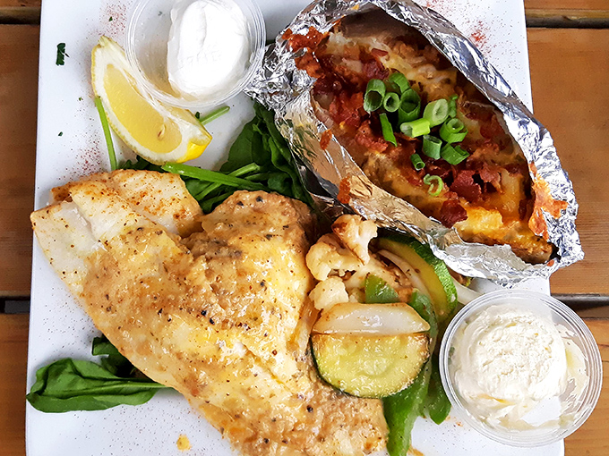 Delicate fish meets vibrant vegetables in this seafood masterpiece that proves Ohio knows its way around ocean fare, geography be damned.