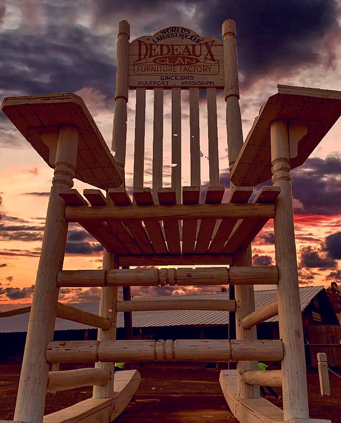 Sunset transforms the World's Largest Rocking Chair into a silhouette worthy of a Southern gothic novel cover.