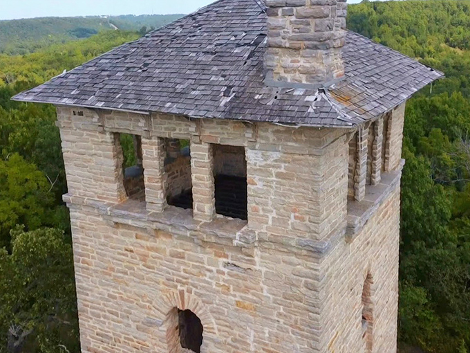 Where medieval dreams meet Ozark reality. The castle's water tower stands like an exclamation point on the landscape. 
