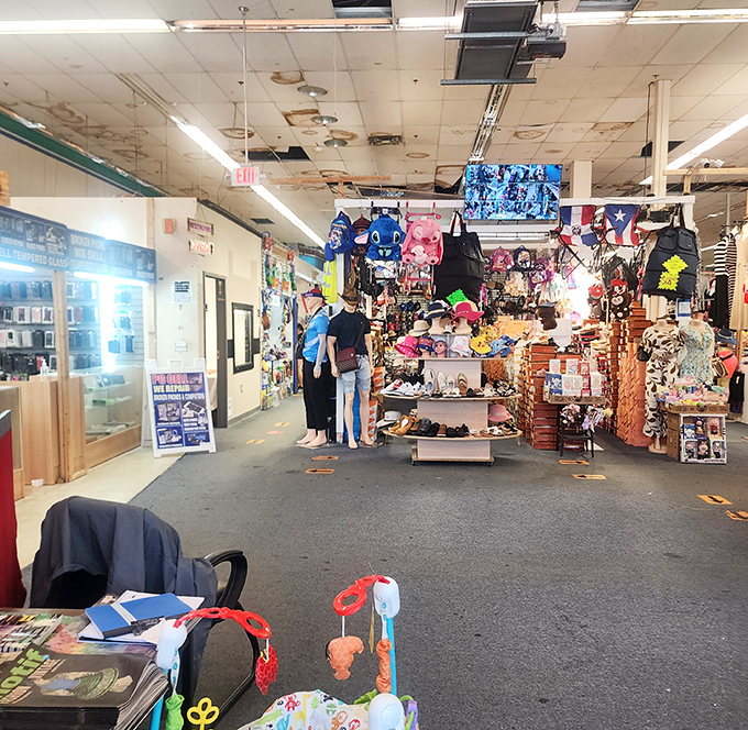 The market's maze-like aisles reveal new worlds around every corner, where mannequins stand guard over kingdoms of affordable fashion.