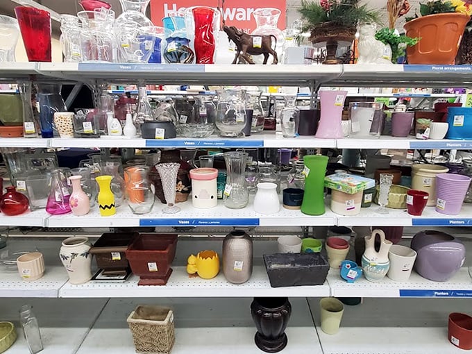 The glassware aisle shimmers with potential – from quirky Charlie Brown mugs to elegant vases that could elevate bodega flowers to centerpiece status.