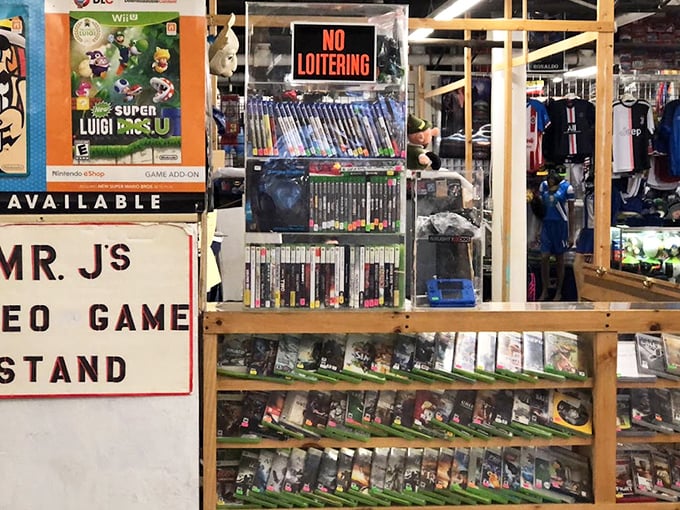 Mr. J's Video Game Stand&mdash;where modern gaming meets nostalgia. That Luigi's Mansion U might be the missing piece in your collection.