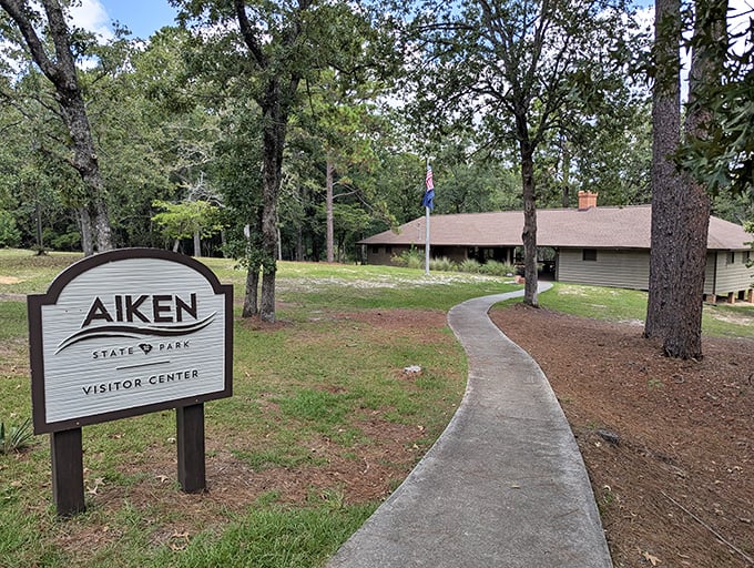 The visitor center welcomes adventurers with that classic park architecture that says, "Yes, there are clean restrooms inside."
