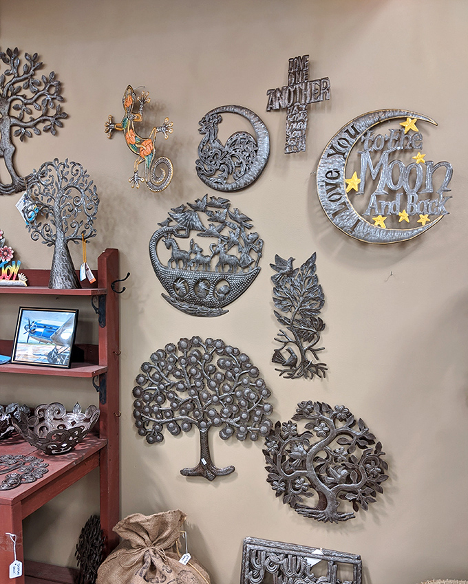 Wall art that transforms blank spaces into conversation pieces. These metal tree sculptures and celestial designs are waiting to make your living room Instagram-worthy.