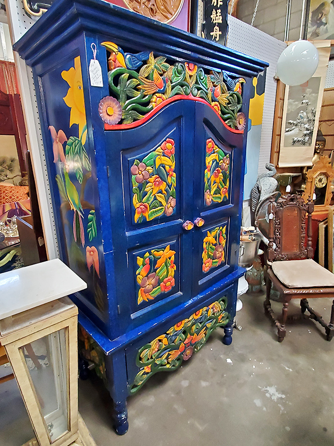 This isn't just a blue cabinet&mdash;it's a riot of color that somehow works perfectly. Marie Kondo might faint, but your living room would never be boring.