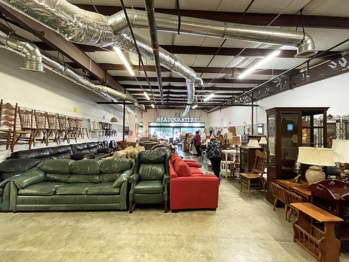 Furniture forest where mid-century meets Victorian meets whatever-that-is. The perfect couch is hiding somewhere in this comfortable chaos.