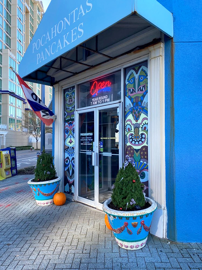 The entrance's vibrant Native American-inspired artwork signals that this isn't your average pancake joint&mdash;it's breakfast with cultural flair.