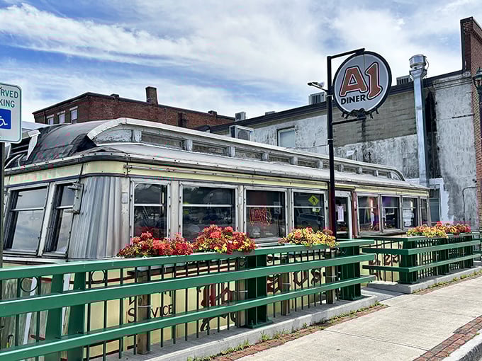 A1 Diner's classic Worcester Lunch Car gleams in the sunshine, a stainless steel time machine serving comfort food with a view.