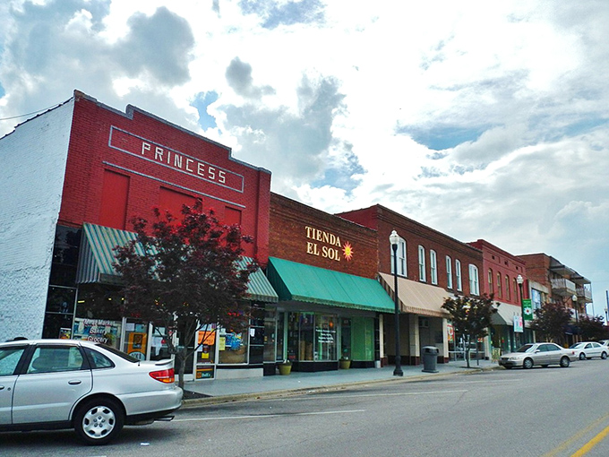 Albertville's main street stretches wide and welcoming, proving that good living doesn't require big budgets.
