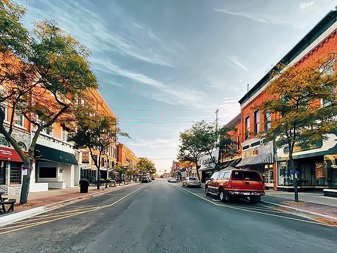 Autumn colors frame Alpena's main street, where seasonal beauty comes standard and inflation hasn't touched the view yet.