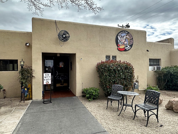Adobe walls and desert landscaping create the perfect New Mexican setting for this hot dog haven with local flair.