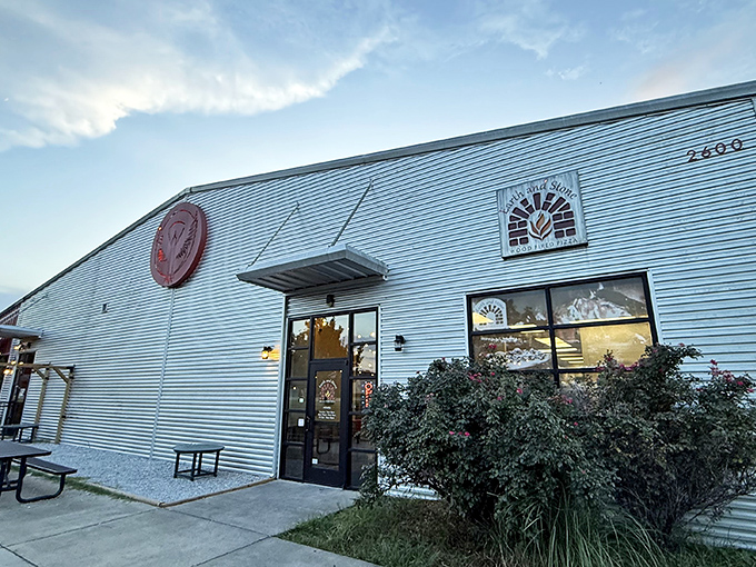 Earth and Stone's industrial exterior hides a primal secret: fire + dough + simple ingredients = pizza perfection.