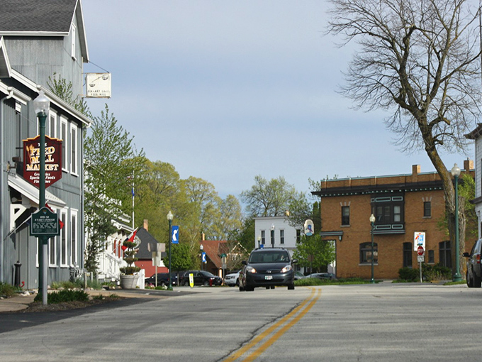 Elkhart Lake's main street offers a perfect blend of historic charm and lakeside relaxation, where every storefront seems to invite you in.