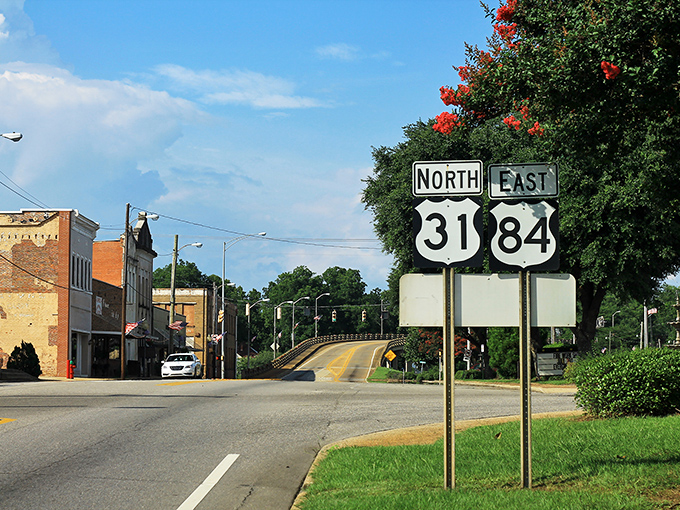 Highway signs mark the crossroads of Evergreen, a town where your retirement dollars stretch further in this peaceful community.
