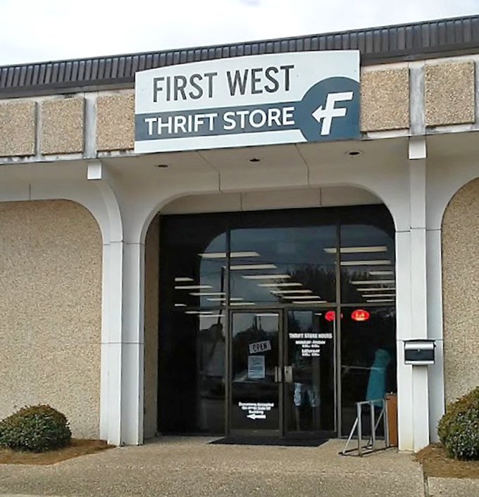 Arched like a mission church, this thrift store entrance promises salvation through savings in charming West Monroe style.