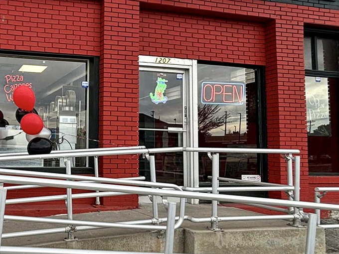 Good Pie's vibrant red brick building stands proud but unpretentious. That straightforward sign tells you exactly what you need to know!