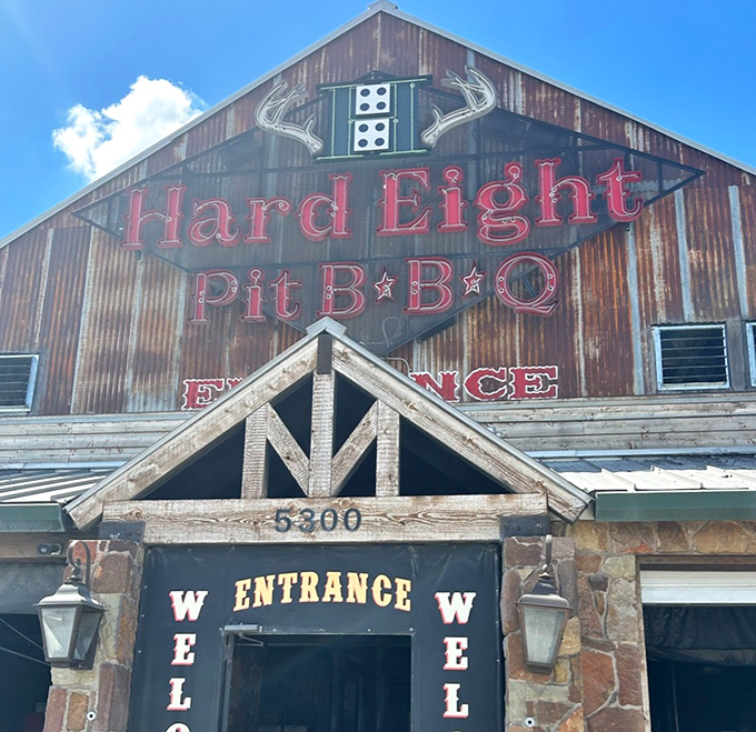 Hard Eight's rustic barn aesthetic promises authentic Texas experiences. Those antlers aren't just decoration&mdash;they're a barbecue philosophy.
