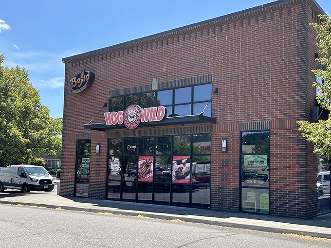 Hog Wild's brick facade houses serious barbecue ambitions. That pig logo isn't just cute - it's a promise of porcine perfection.