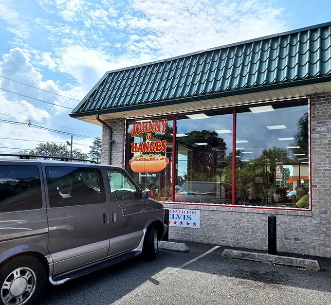 The sign glows with hot dog promise. Johnny & Hanges keeps it simple&mdash;because when you're this good, you don't need fancy.