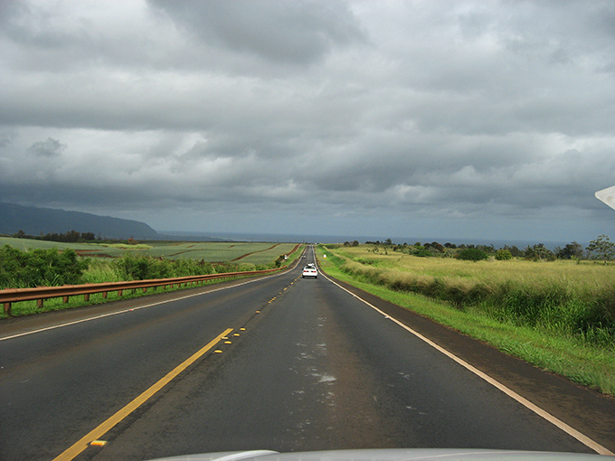 Fifty shades of gray&mdash;Hawaii edition! Kamehameha Highway cuts through misty fields where even overcast skies can't dampen the island's lush beauty.