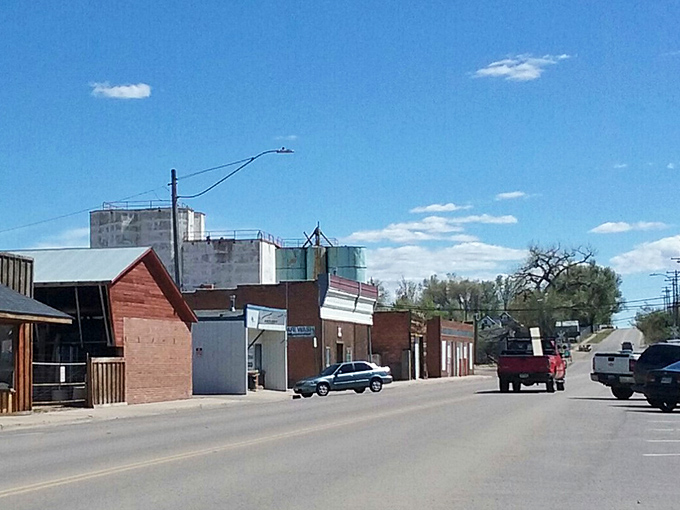 Kersey's railroad crossing marks the entrance to affordability. Small town, big savings!