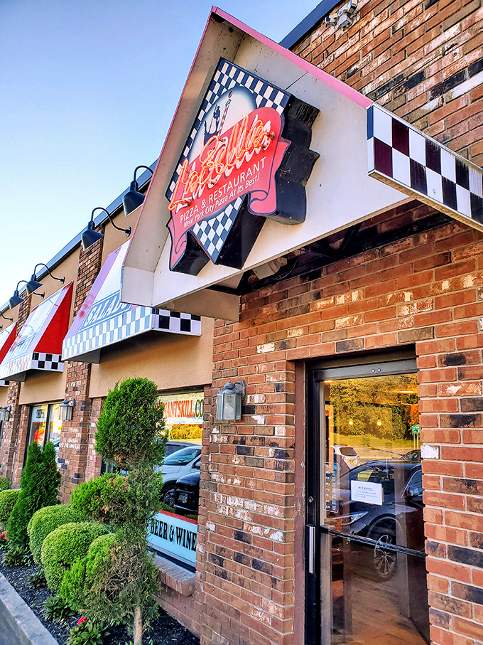 Labella Pizza: That playful checkered awning isn't just decoration - it's a finish line flag for your hunger race.