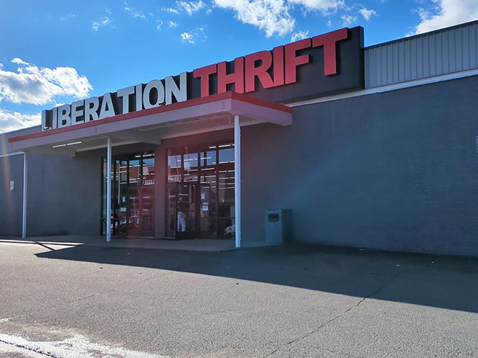 Liberation Thrift's bold red signage makes a statement as strong as its values. Shopping with purpose never looked so good!