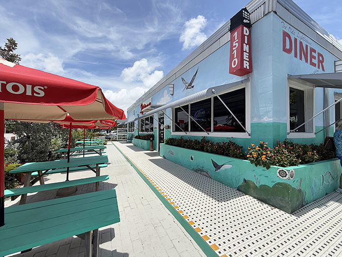 The Lighthouse Diner's seafoam exterior and nautical theme set the stage for breakfast with a coastal accent that locals treasure.