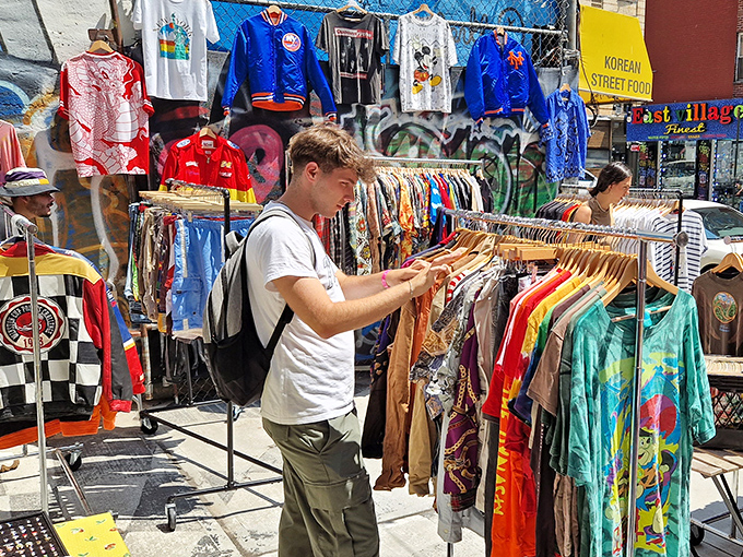 At Ludlow Flea, vintage clothing gets a second chance &ndash; this shopper might discover his next favorite shirt among the racks.