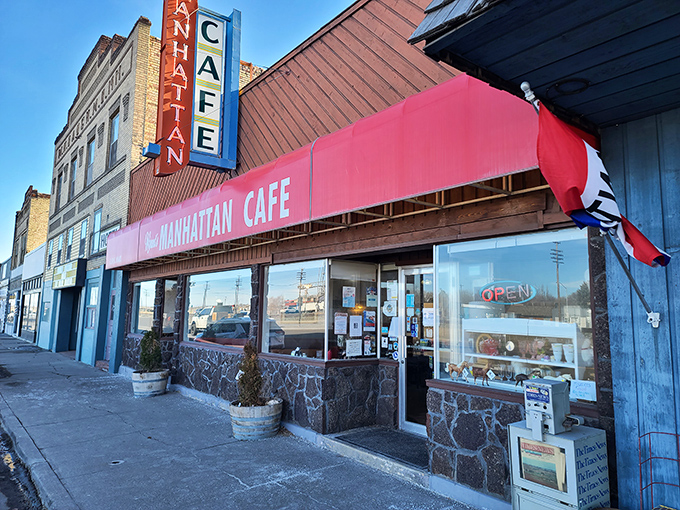 The Manhattan Cafe's bold red awning brightens Shoshone's main street. Small town, big flavors waiting inside.