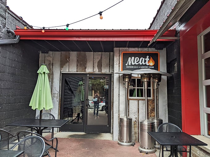 Meat BBQ's weathered exterior and string lights create that perfect "you've discovered something special" vibe that BBQ hunters live for.